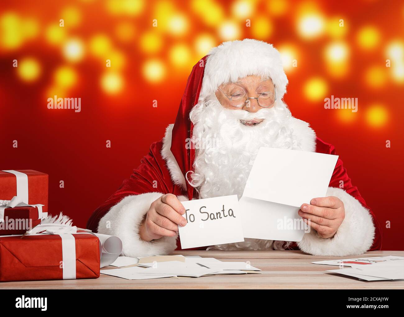 Santa reading letters hi-res stock photography and images - Alamy