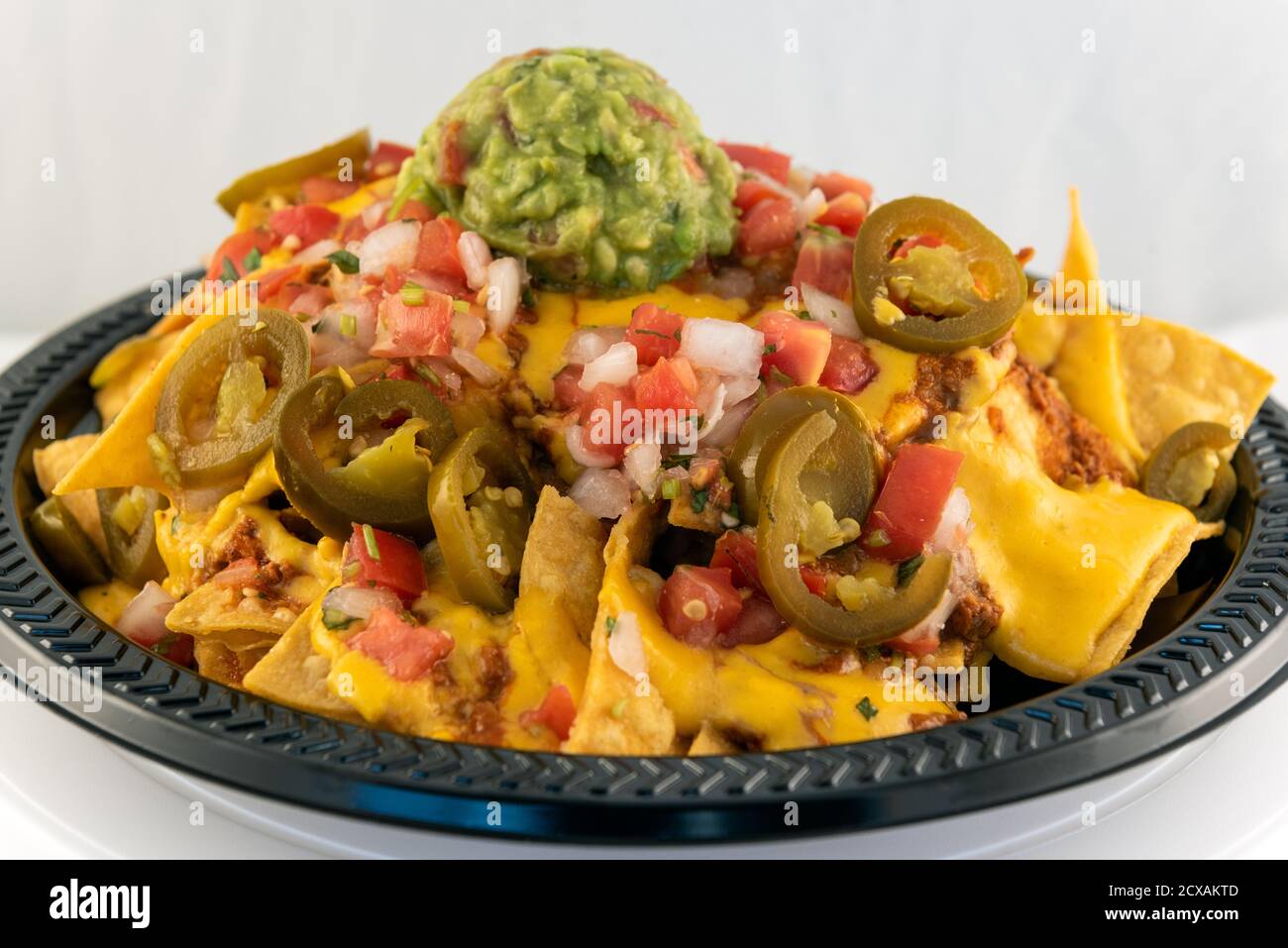 Hearty meal of vegan nachos tempts the taste buds to eat the entire ...
