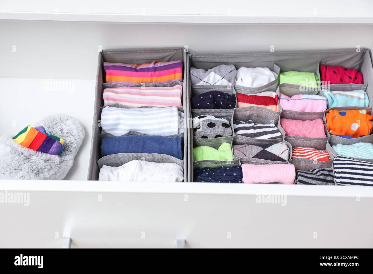 Open drawer with clean clothes in closet Stock Photo - Alamy