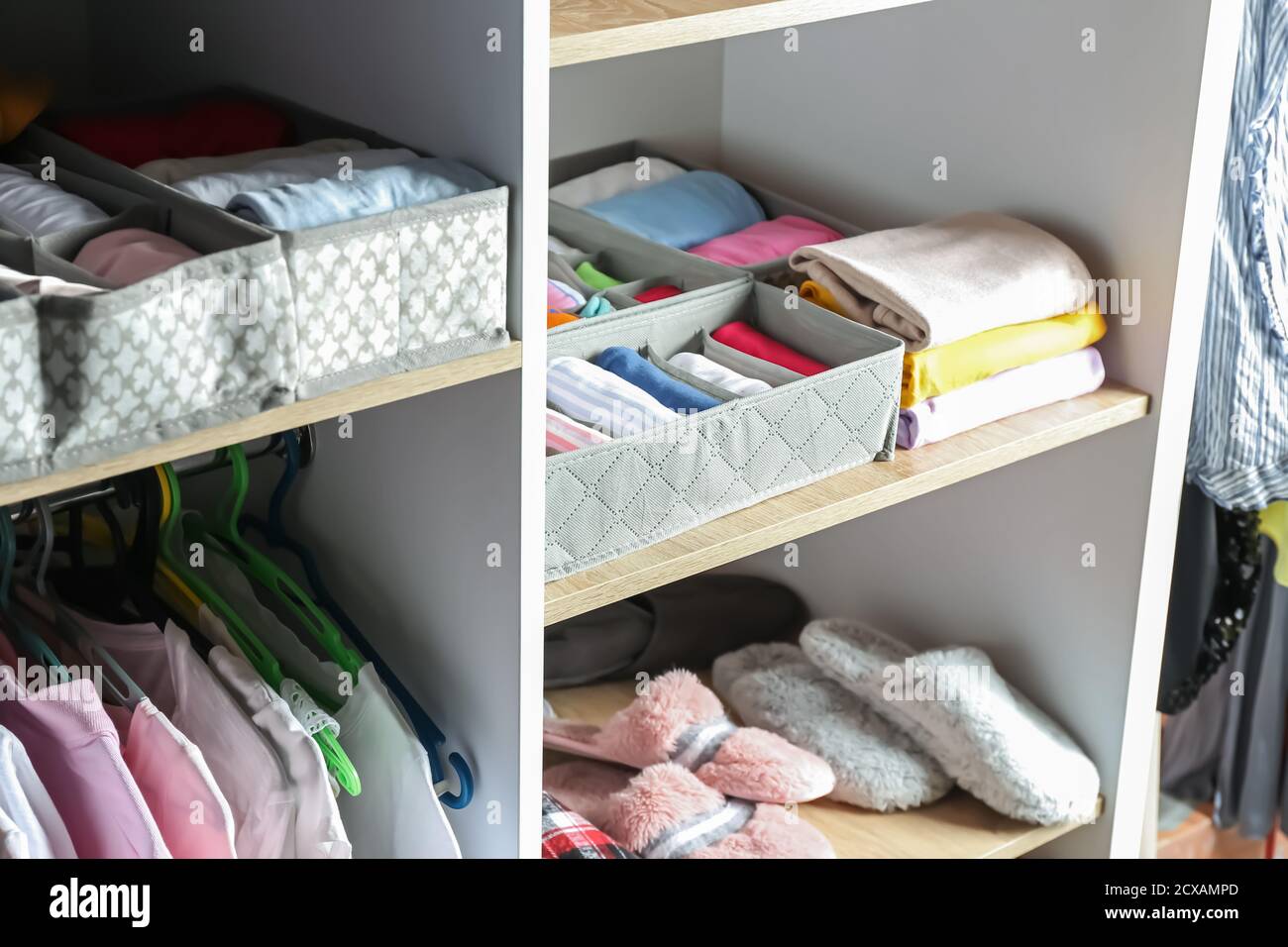 Modern wardrobe with clean clothes Stock Photo - Alamy