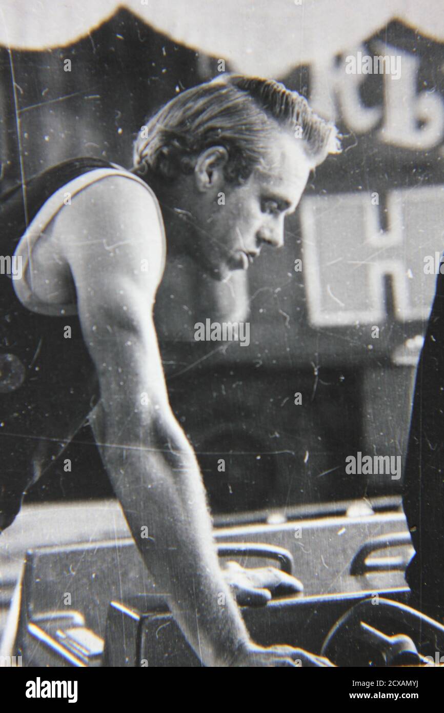 Fine 1970s vintage black and white photography of a regular guy ride ...