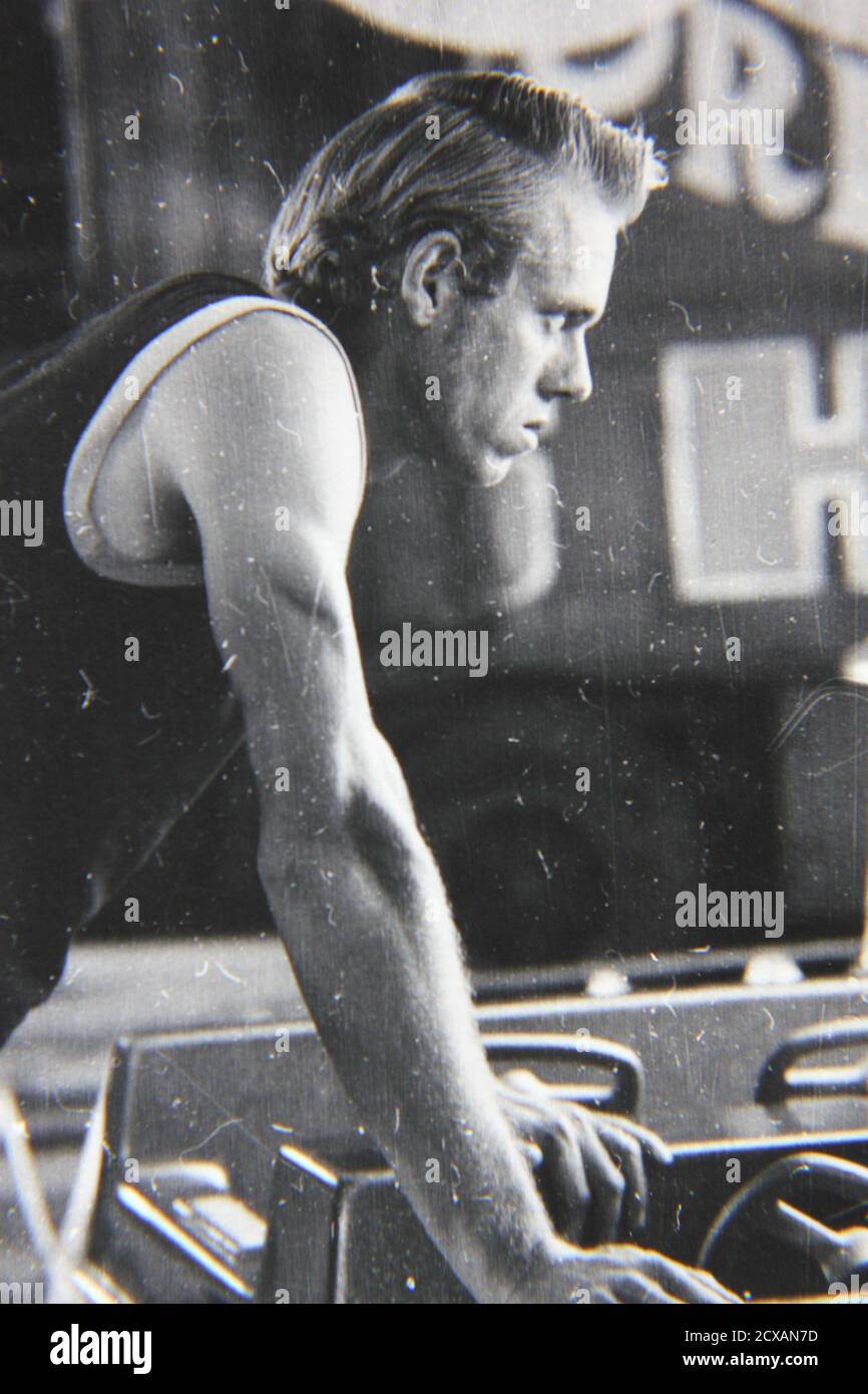 Fine 1970s vintage black and white photography of a regular guy ride ...