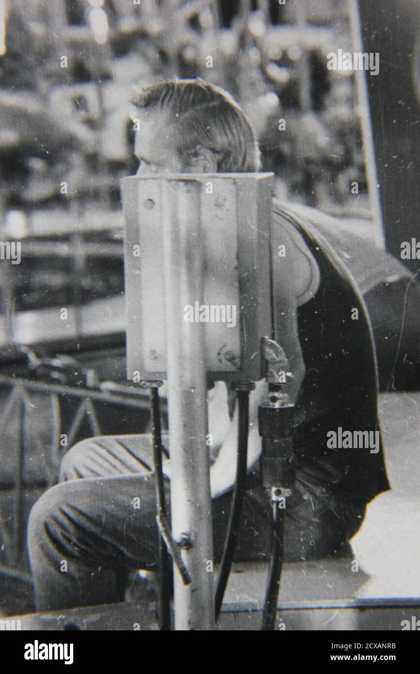 Fine 1970s vintage black and white photography of a regular guy ride ...