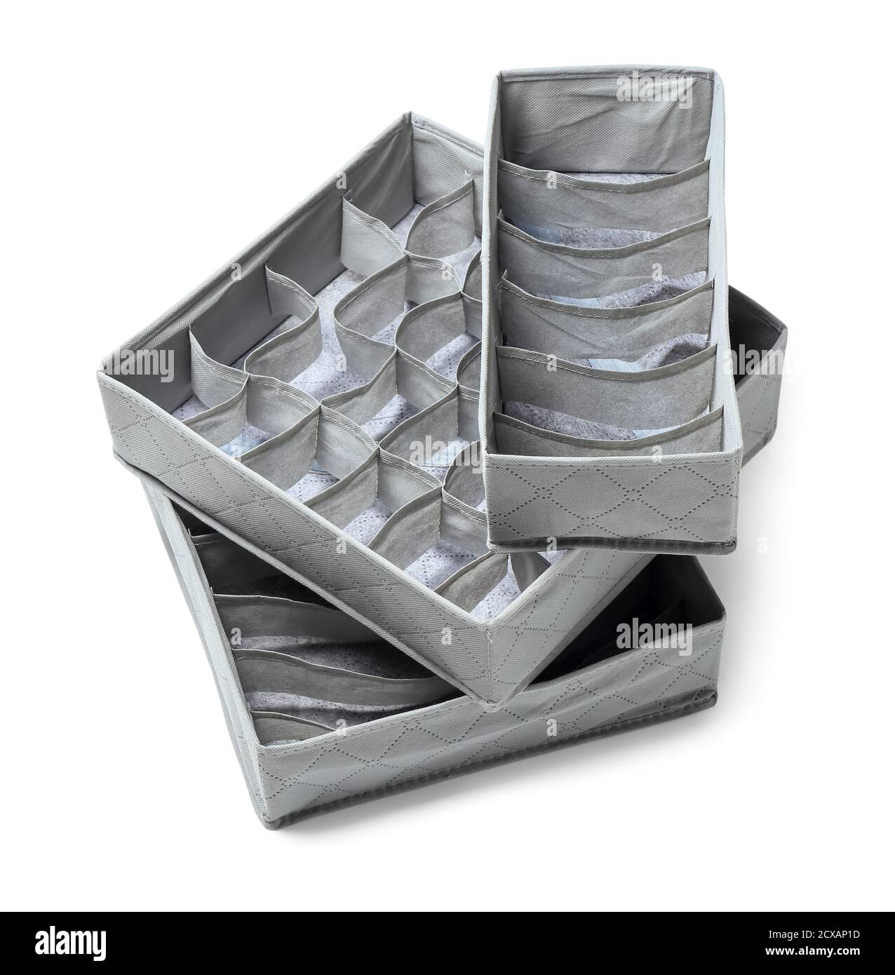 Empty organizers for clean clothes on white background Stock Photo - Alamy