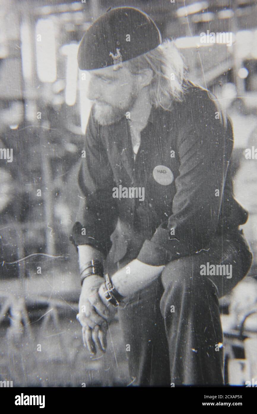 Fine 1970s vintage black and white photography of a regular guy ride ...