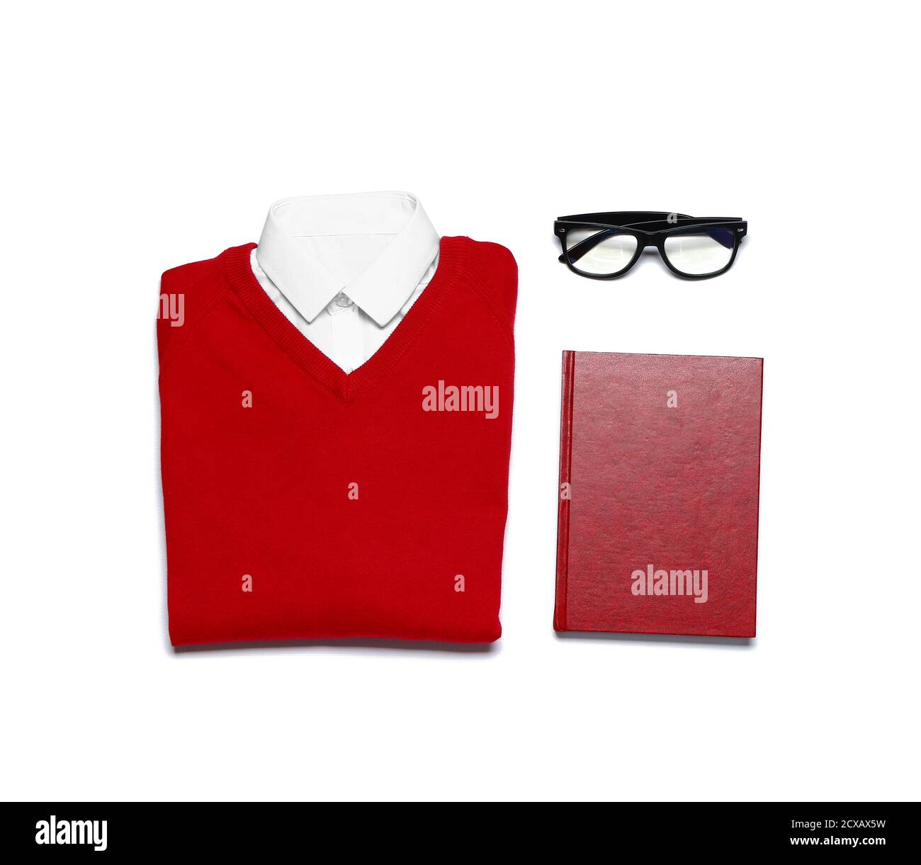 Stylish school uniform with book on white background Stock Photo - Alamy