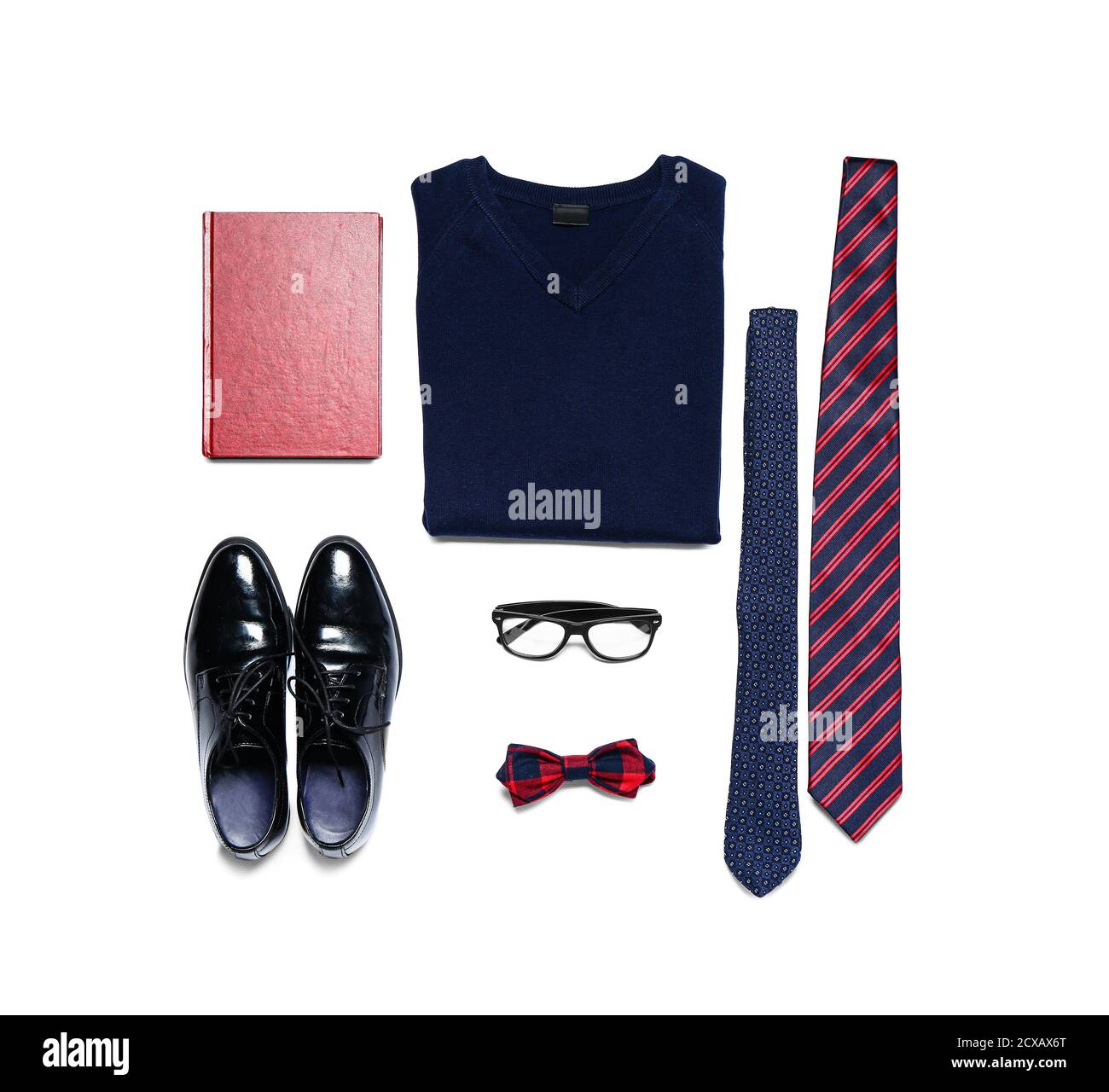 Stylish school uniform with book on white background Stock Photo - Alamy