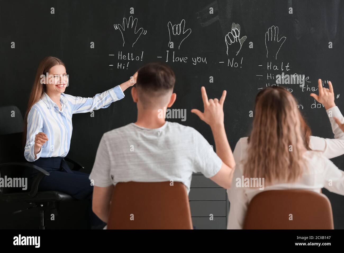 Non verbal communication teacher hi-res stock photography and images ...