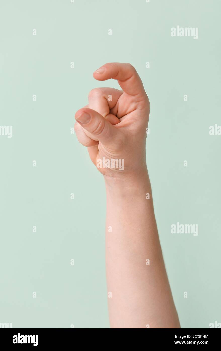 Hand showing letter X on color background. Sign language alphabet Stock ...