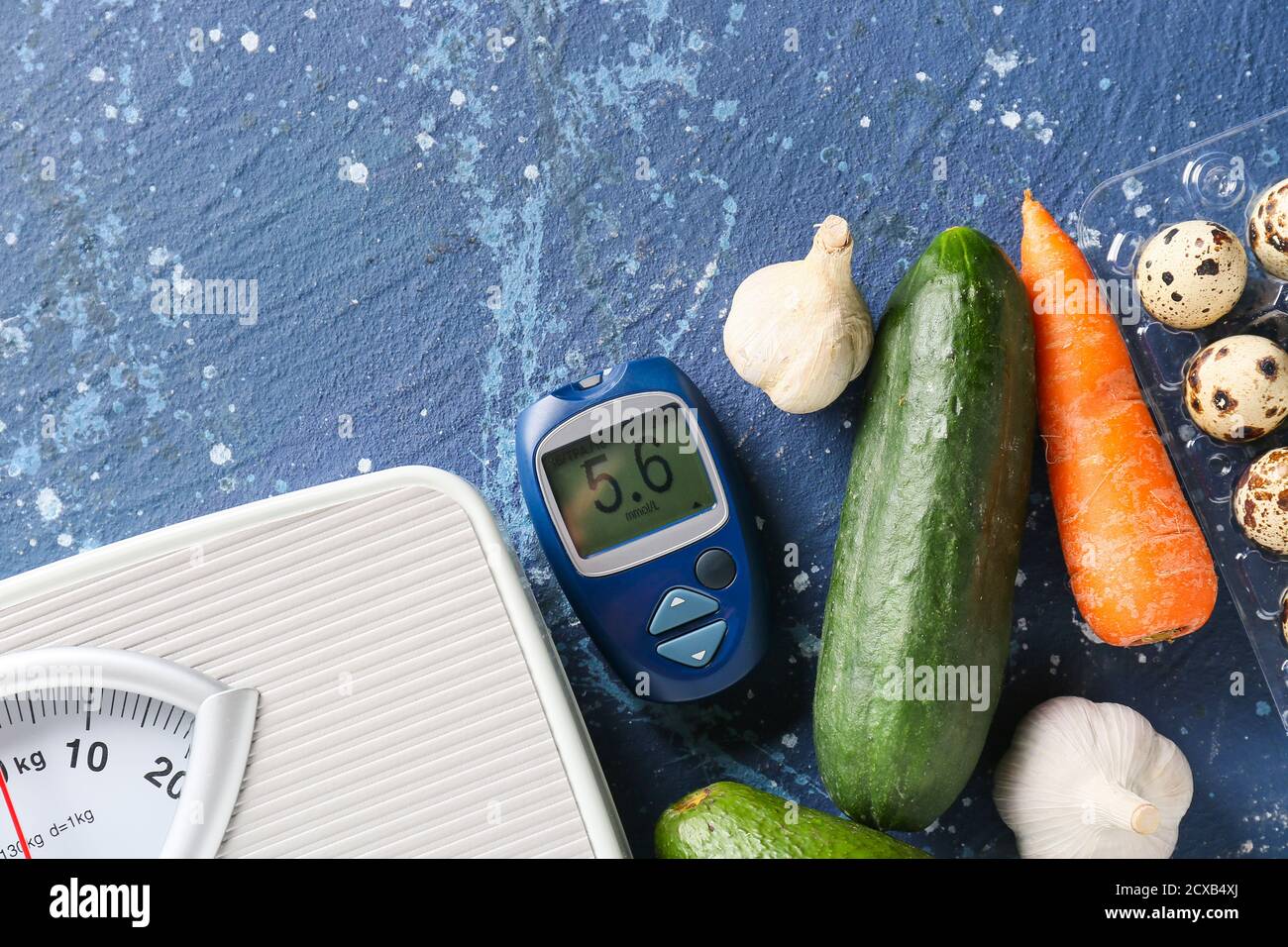 Vegetables, scales and glucometer on color background. Diabetes concept ...