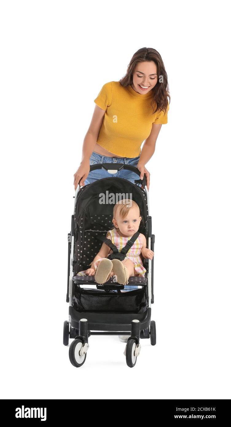 Woman and her cute baby in stroller on white background Stock Photo - Alamy