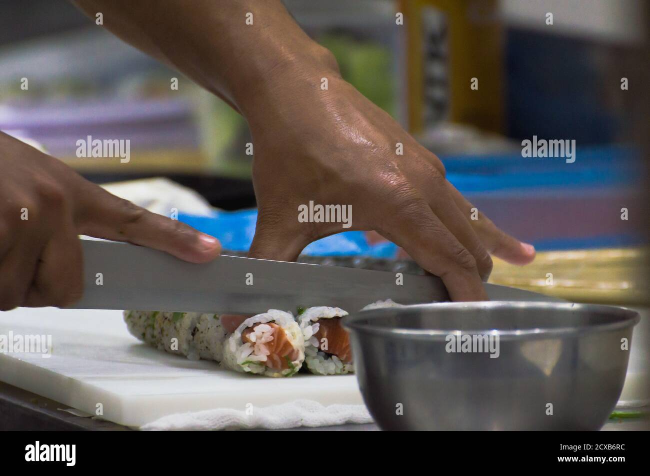 Closeup of chef hands preparing japanese food. Japanese chef making ...