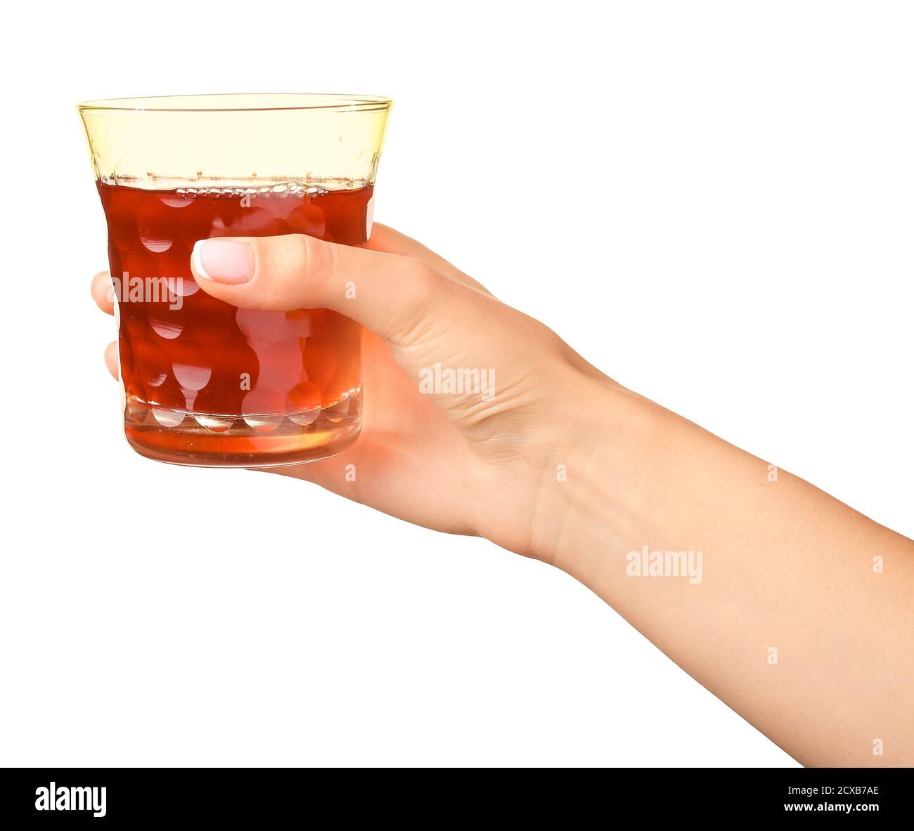 Hand with glass of fresh juice on white background Stock Photo - Alamy
