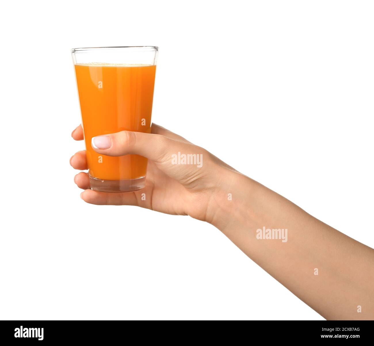 Hand with glass of fresh juice on white background Stock Photo - Alamy
