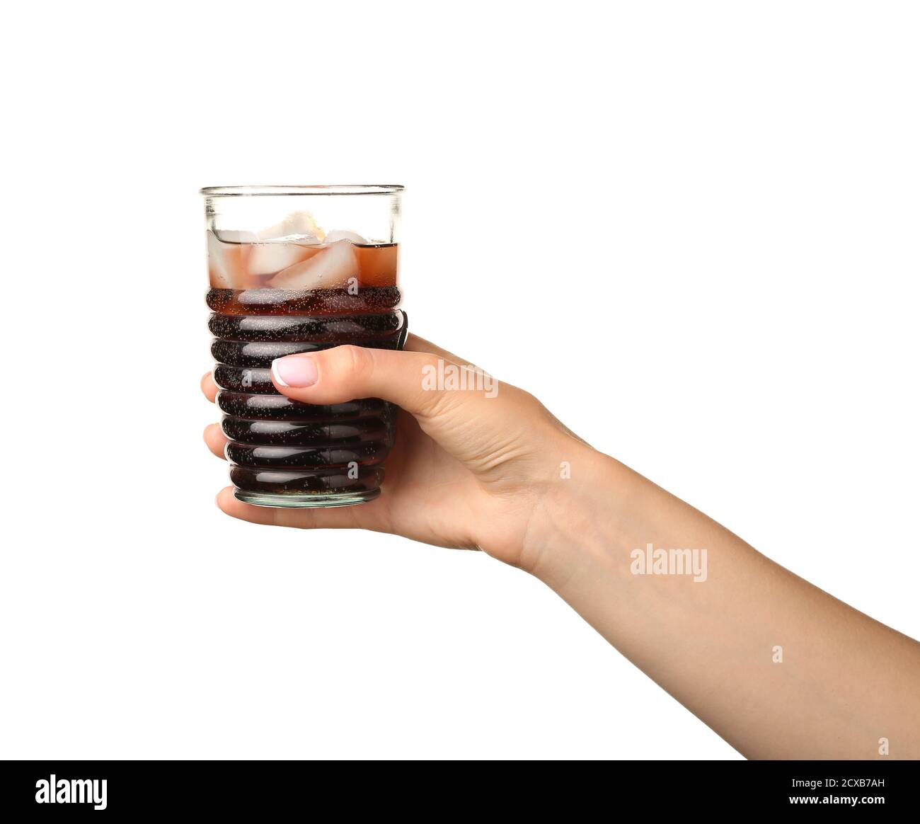 Hand with glass of tasty cola on white background Stock Photo - Alamy