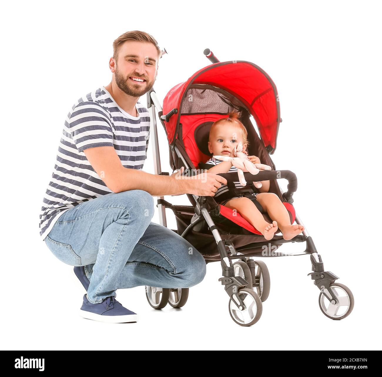 Father and his cute baby in stroller on white background Stock Photo ...