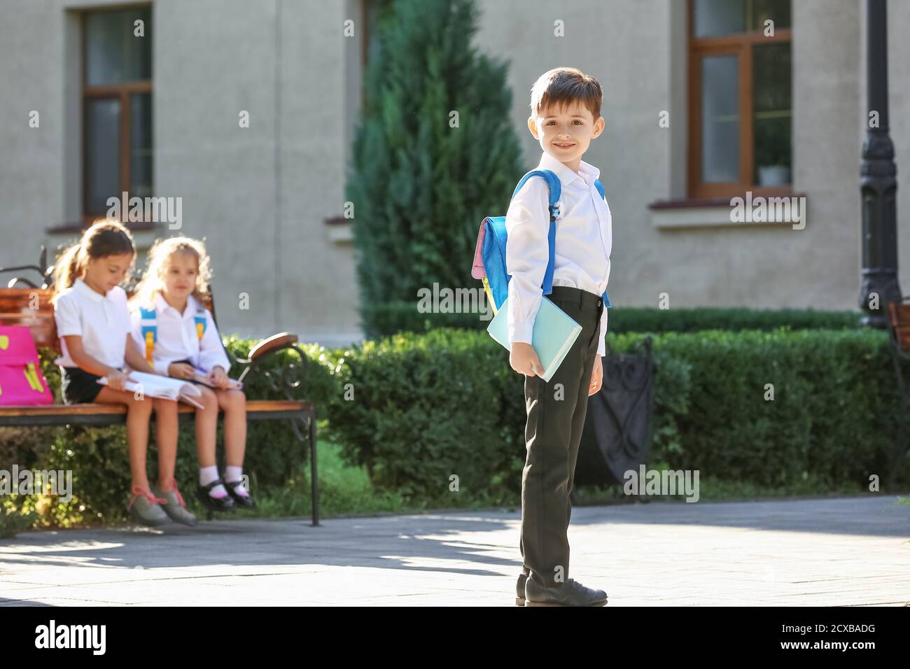 Little pupil near school outdoors Stock Photo - Alamy