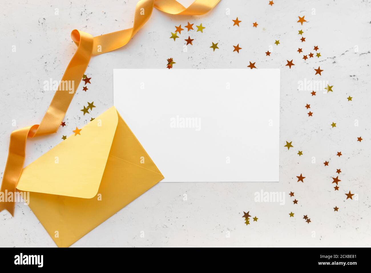 Beautiful Christmas composition with empty card and envelope on white ...