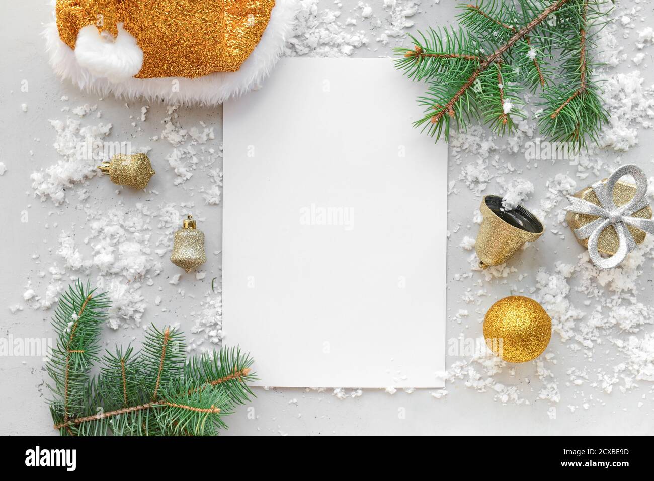 Beautiful Christmas decorations with empty card on light background ...