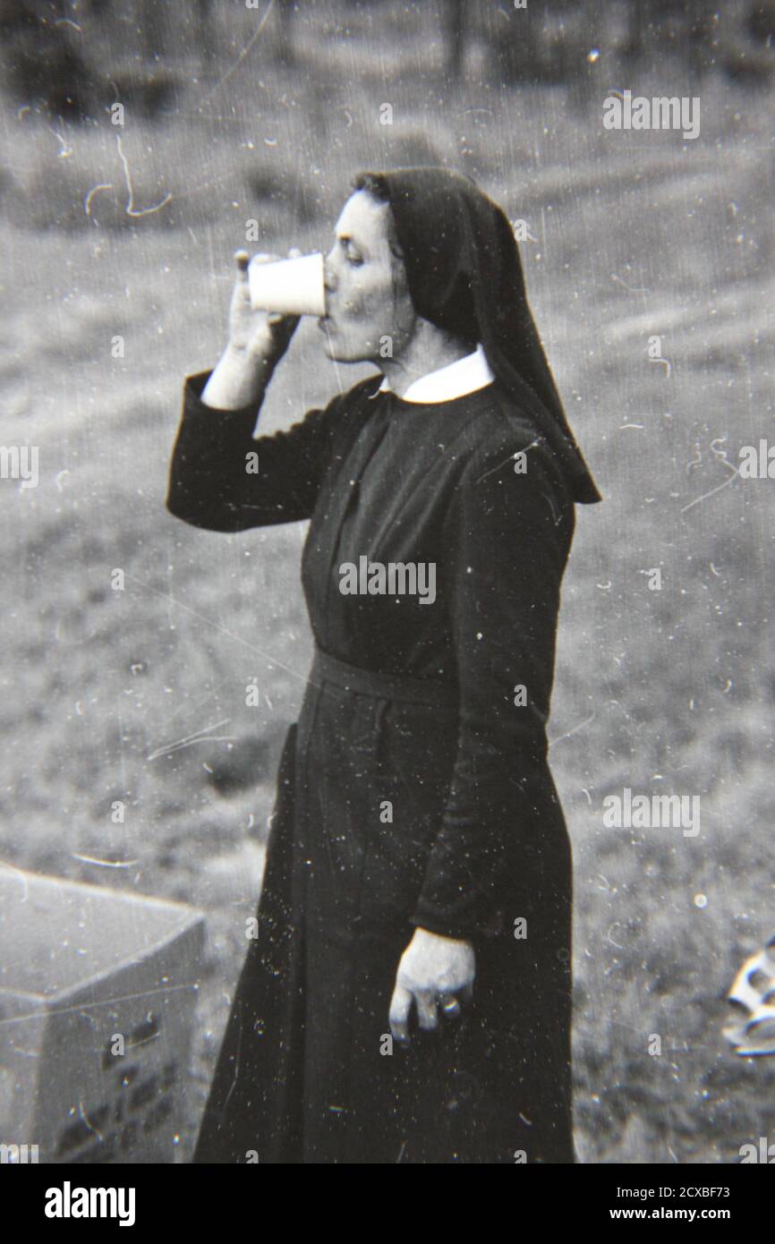 Nun drinking hi-res stock photography and images - Alamy