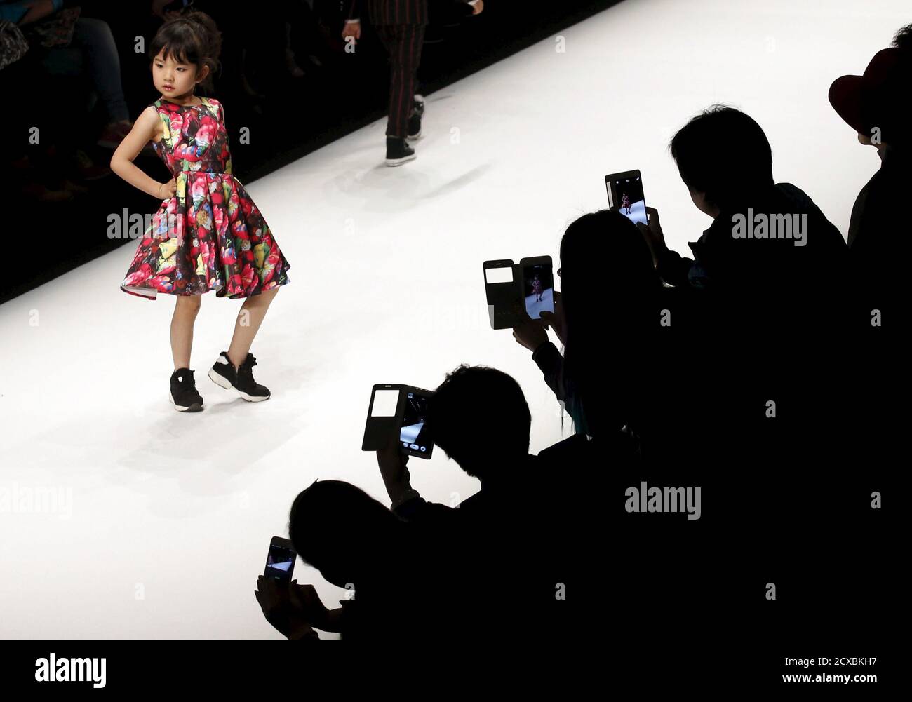 Child girl model catwalk hi-res stock photography and images - Alamy