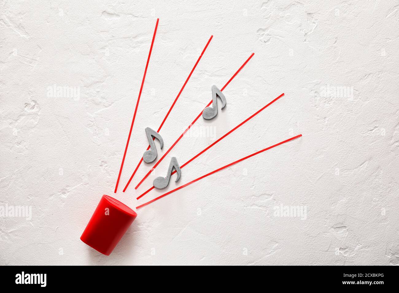 Loud speaker with music notes on white background Stock Photo - Alamy