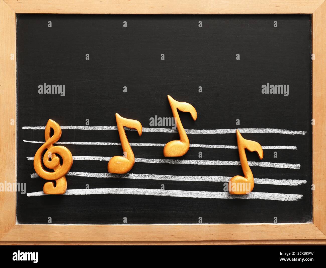 Chalkboard with music notes, top view Stock Photo - Alamy