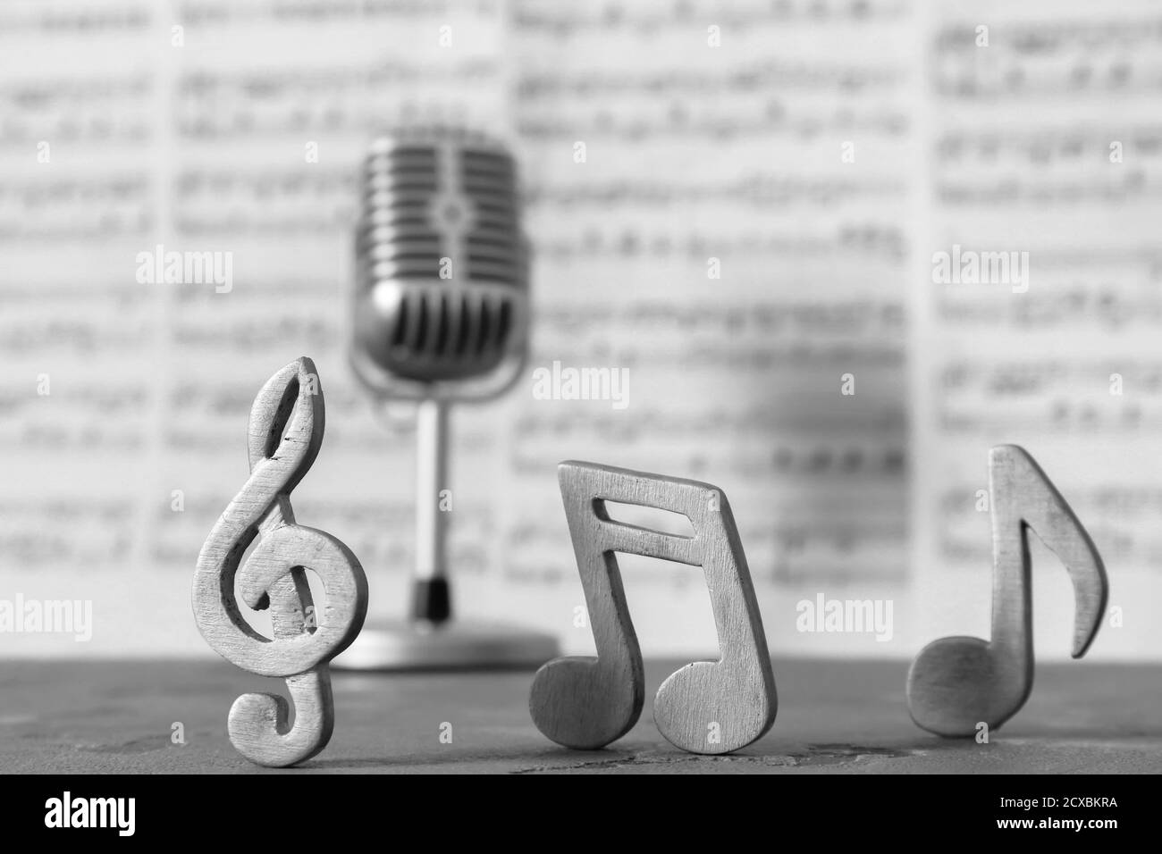 Music notes on table, closeup view Stock Photo - Alamy