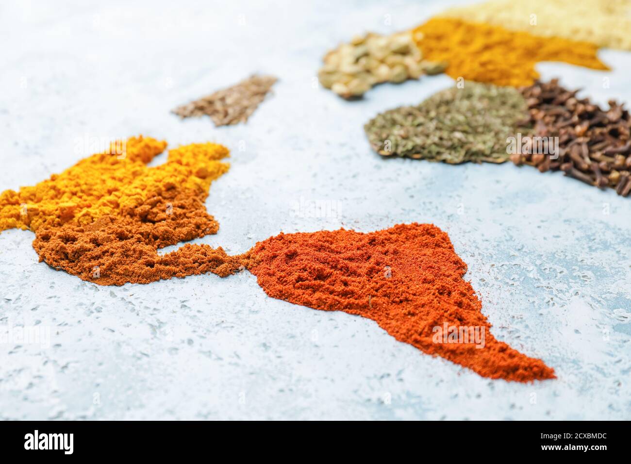 World map made of different spices on light background Stock Photo - Alamy