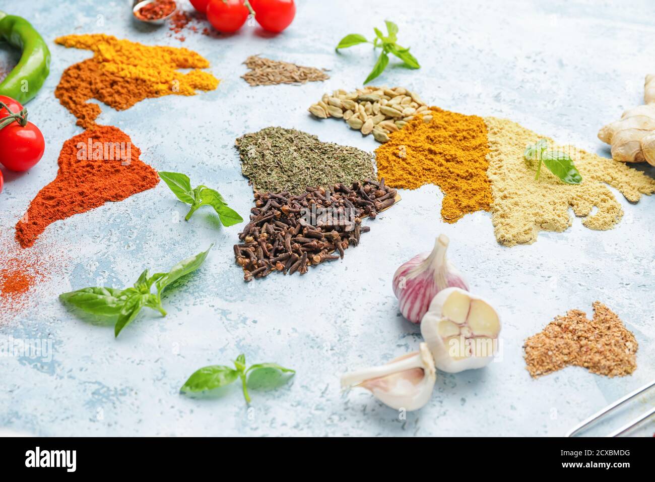World map made of different spices on light background Stock Photo - Alamy