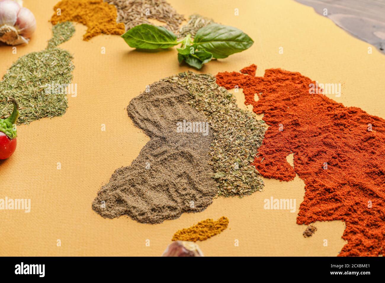 World map made of different spices on table Stock Photo - Alamy