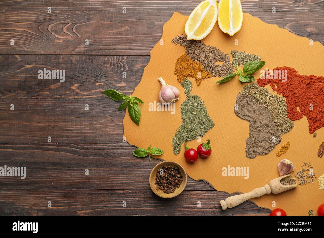 World map made of different spices on wooden background Stock Photo - Alamy