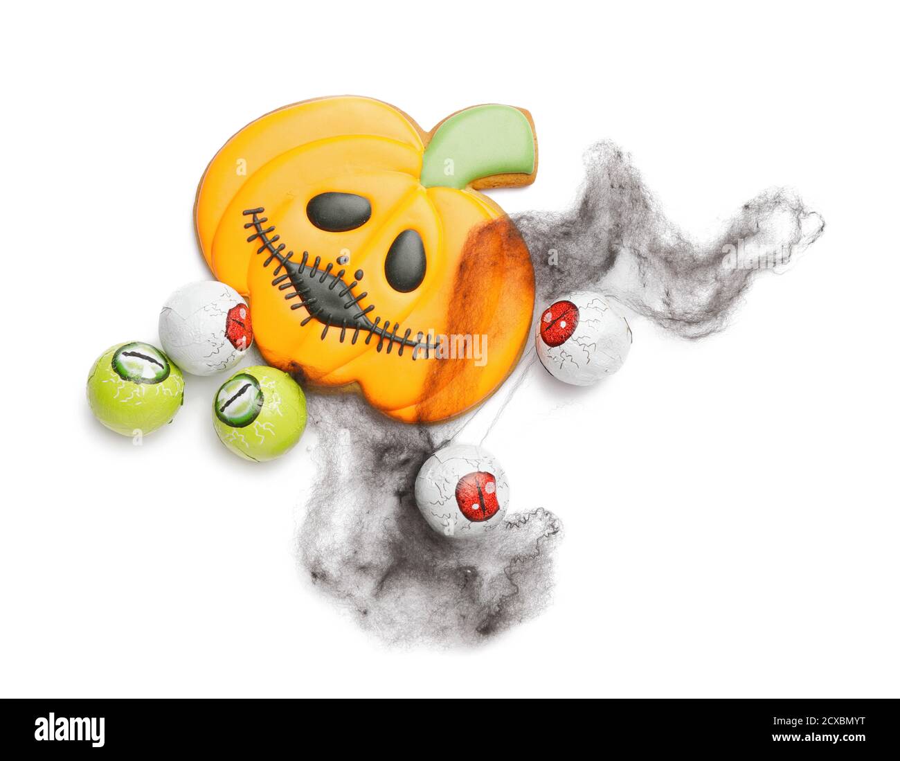 Tasty scary candies and cookie for Halloween on white background Stock ...