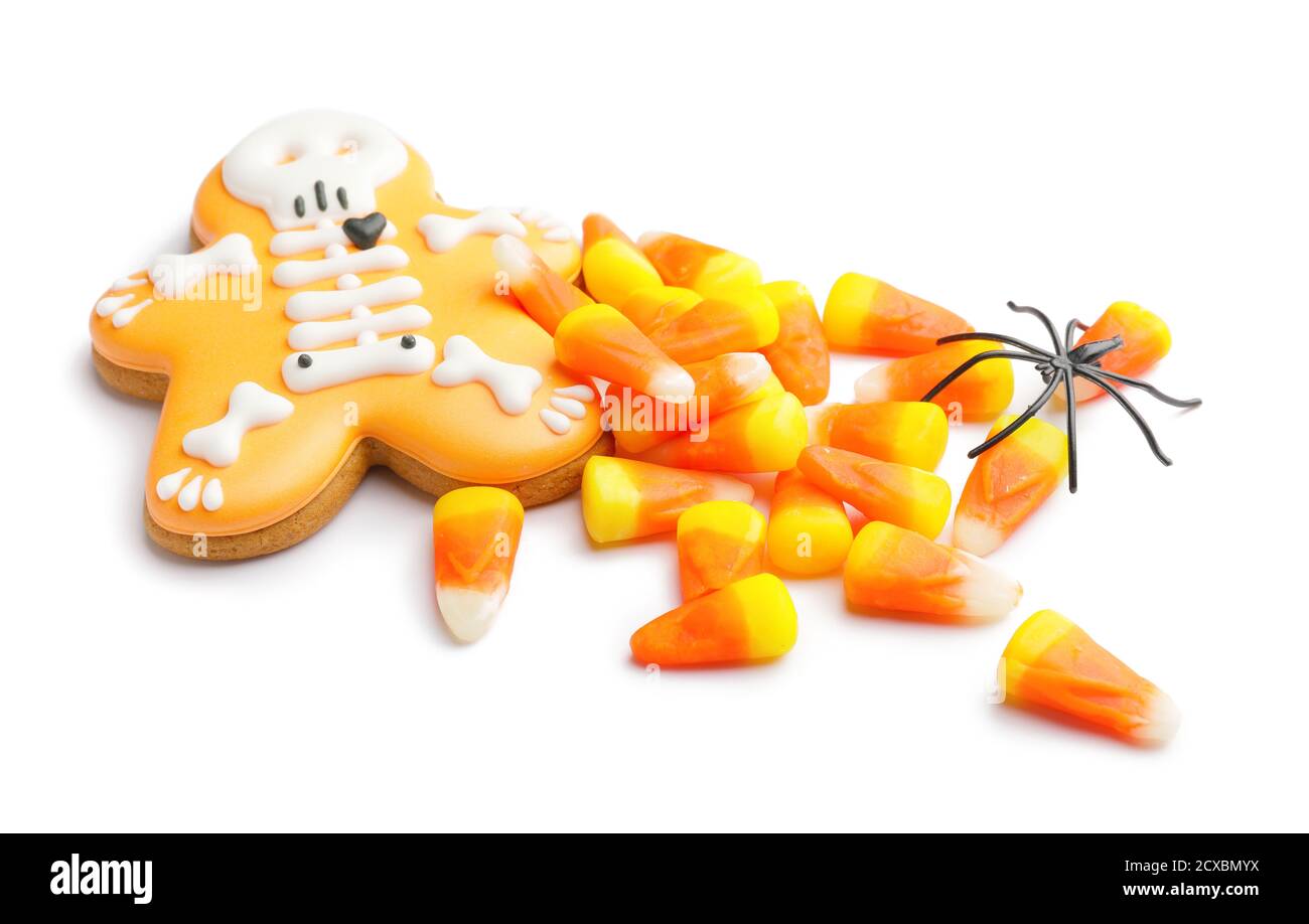 Tasty scary candies and cookie for Halloween on white background Stock ...