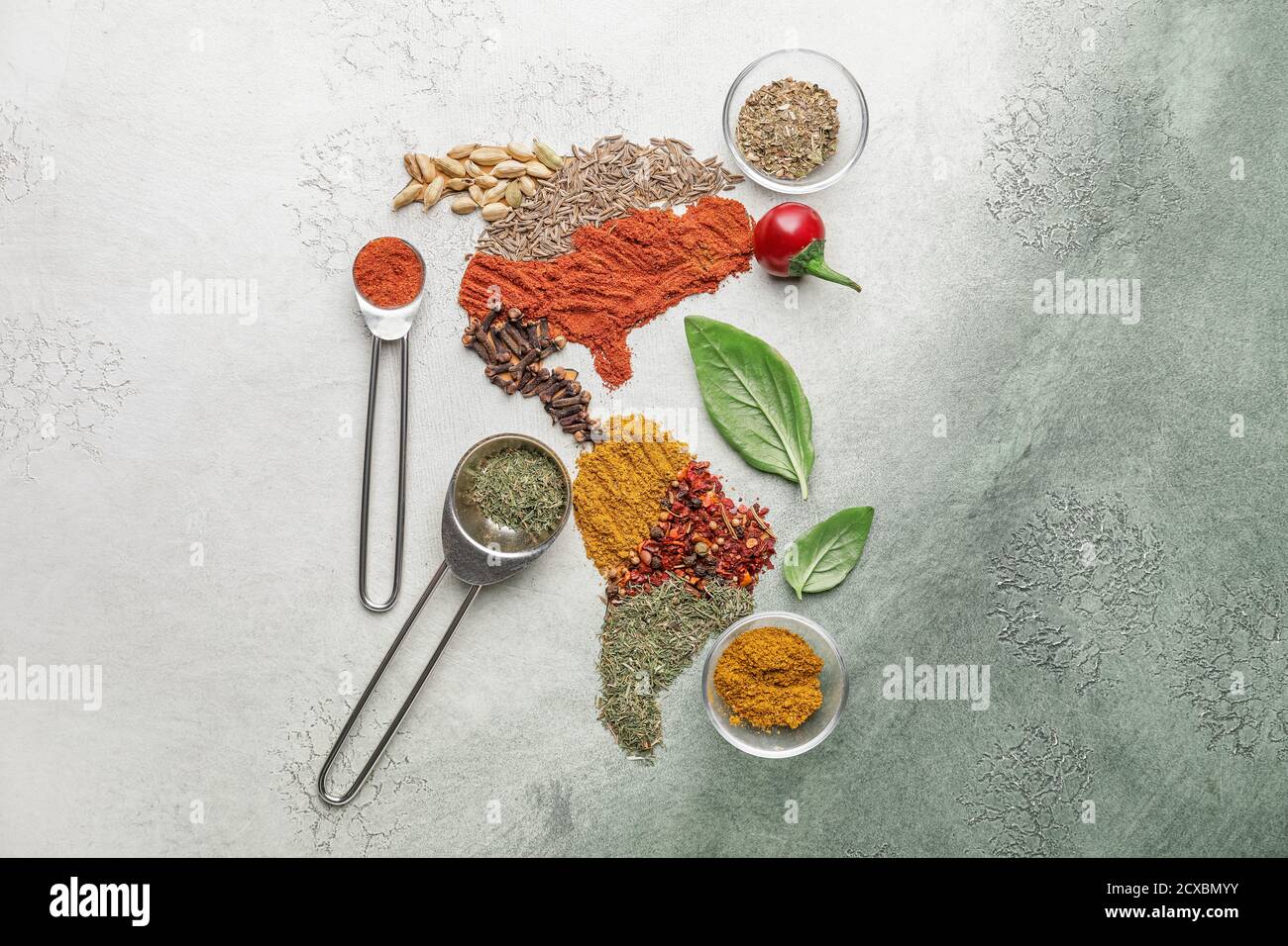North and South America made of spices on color background Stock Photo ...