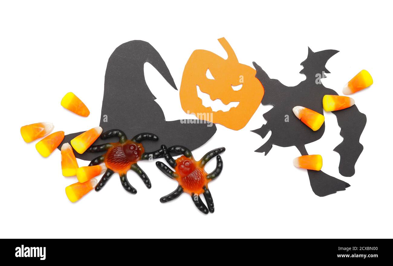 Tasty scary candies and decor for Halloween on white background Stock ...