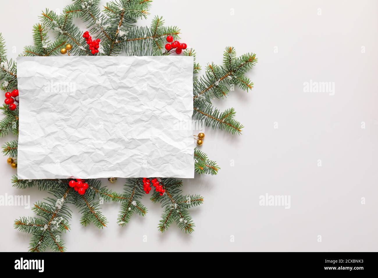 Beautiful Christmas decorations with empty card on white background ...