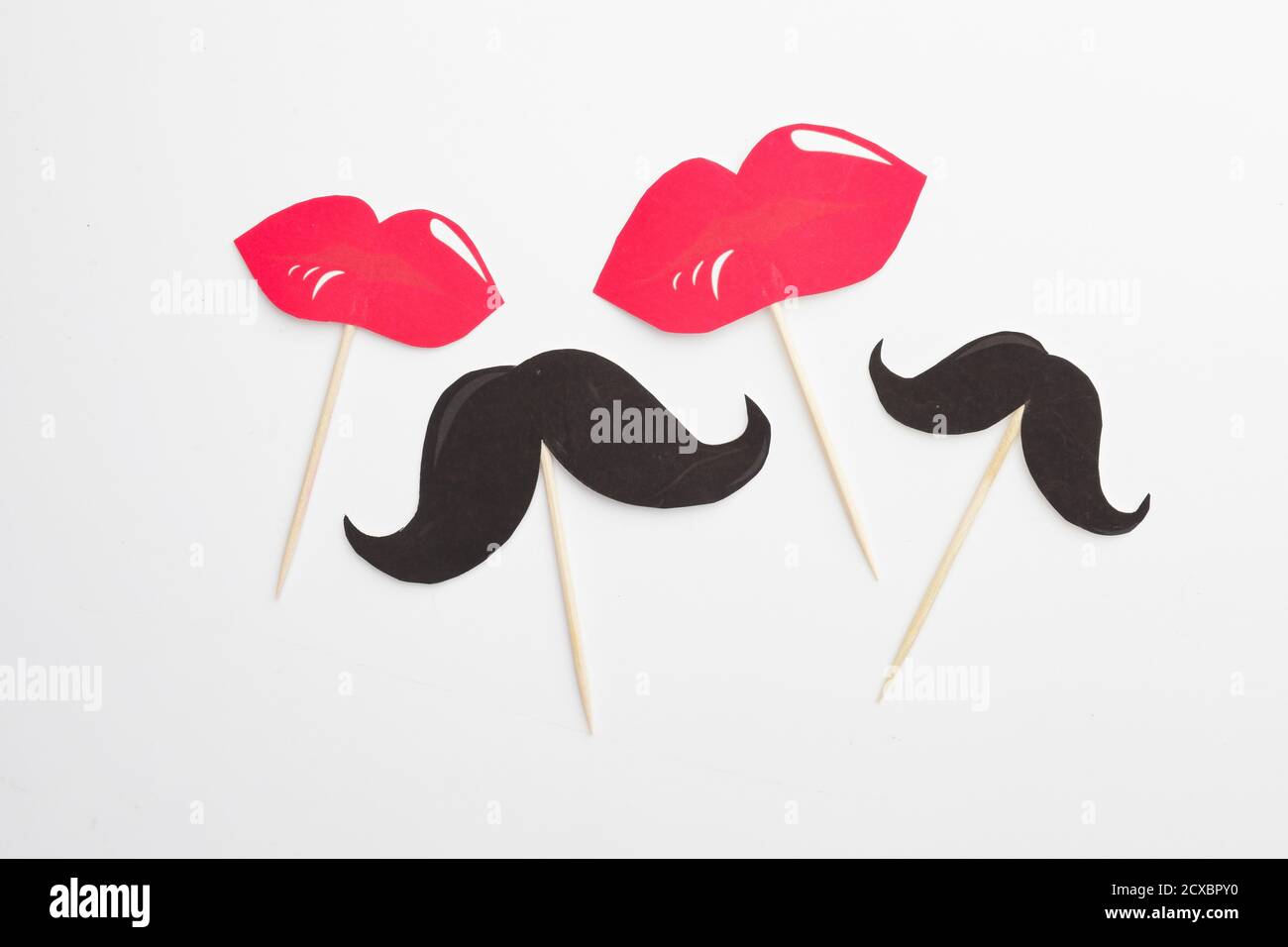 Stylish cupcake toppers on white background Stock Photo - Alamy