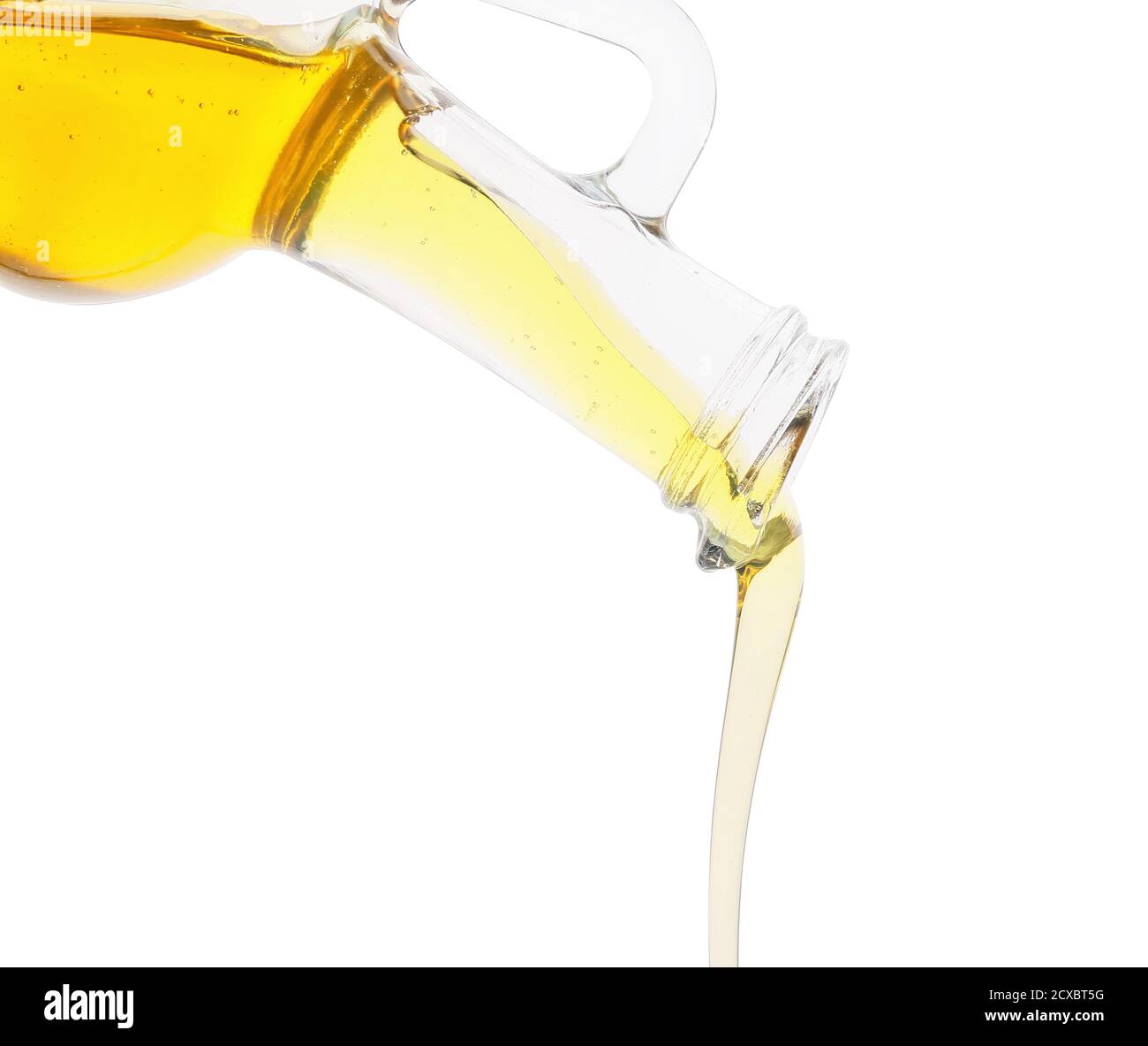 Pouring of fresh olive oil from bottle on white background Stock Photo ...