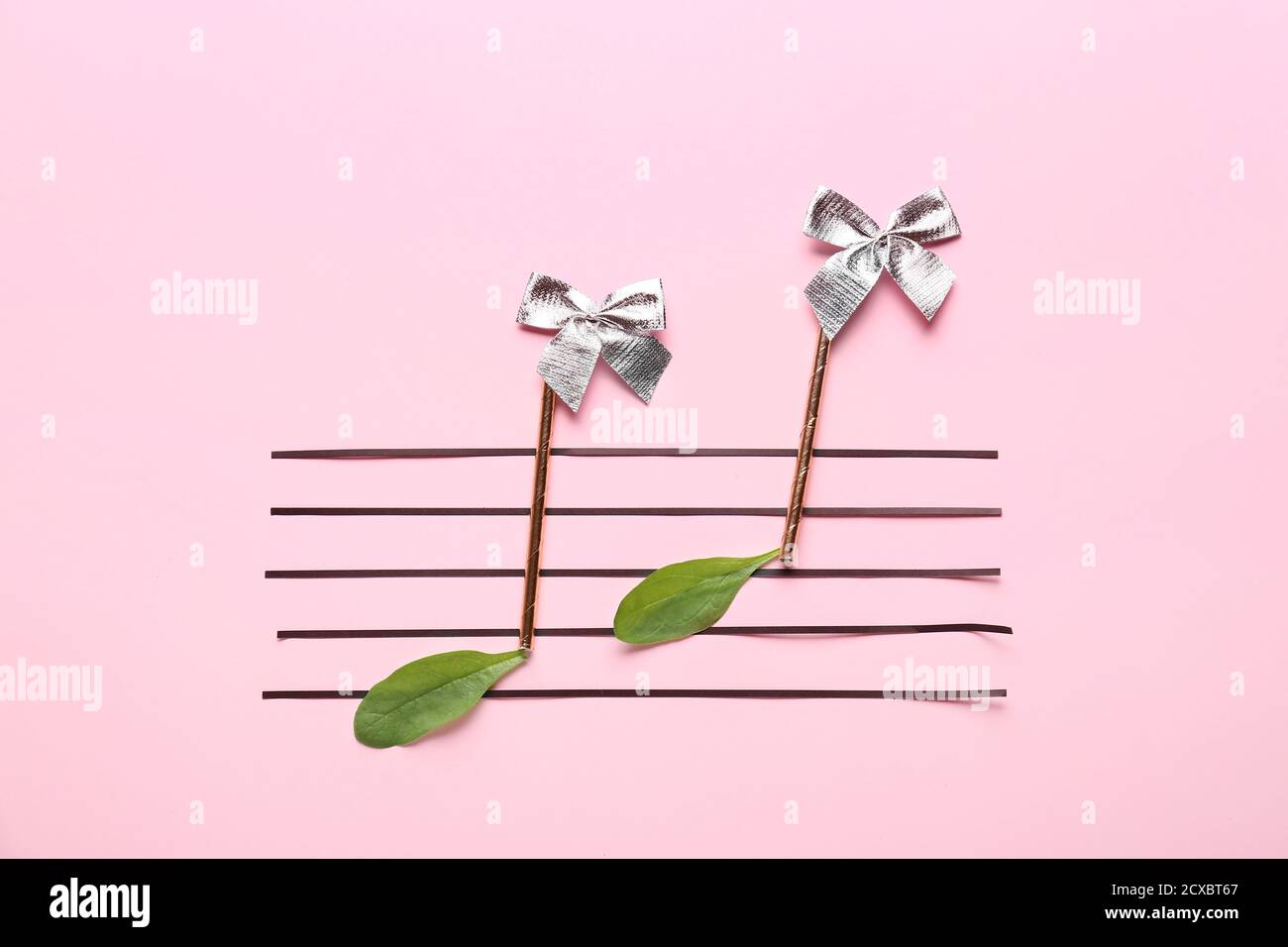 Music notes made of different materials on color background Stock Photo ...
