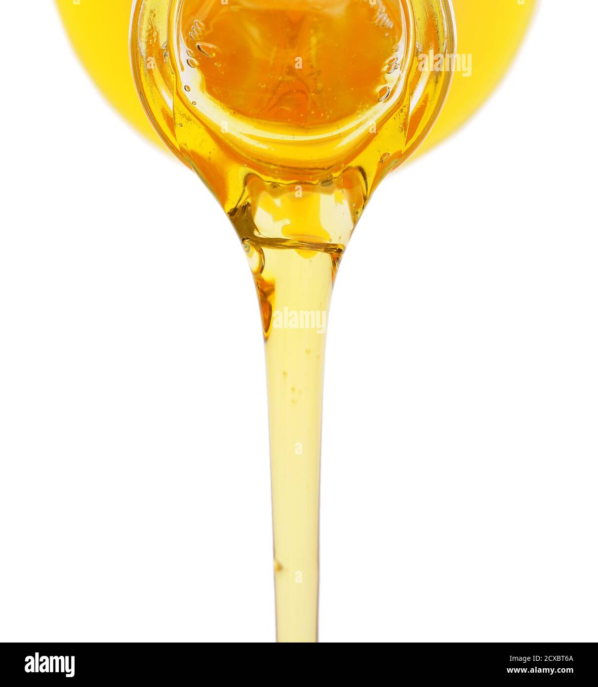 Pouring of fresh olive oil from bottle on white background Stock Photo ...