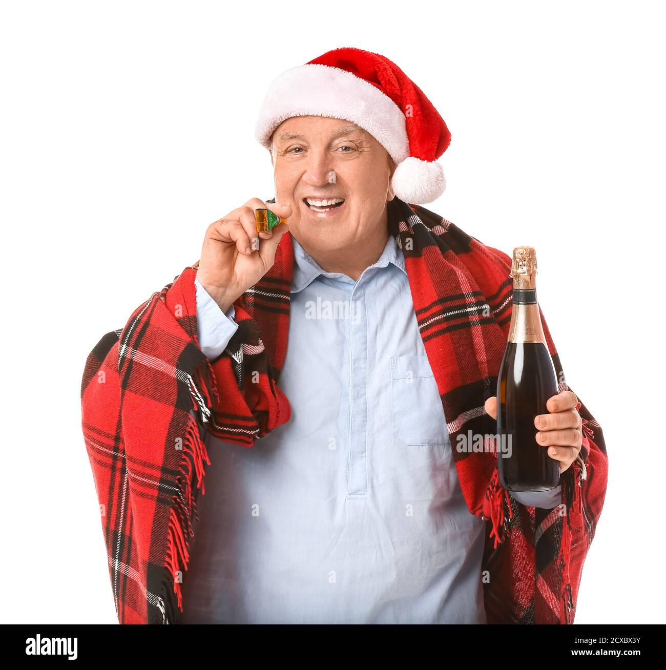 Elderly man celebrating Christmas on white background Stock Photo - Alamy