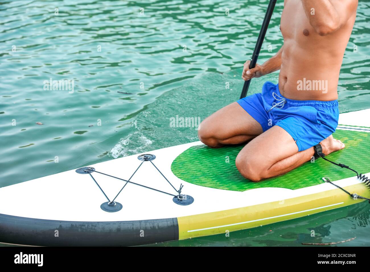 Man paddleboarding mountains hi-res stock photography and images - Alamy