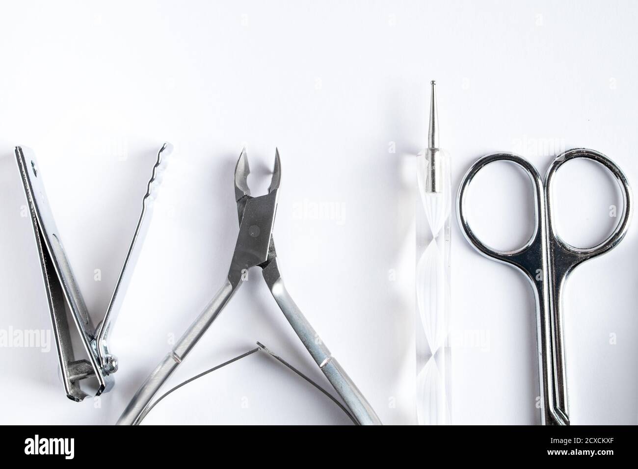 Tools for manicure and nail care on a white background Stock Photo - Alamy