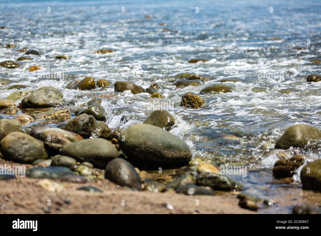 Water rushing on sand hi-res stock photography and images - Alamy