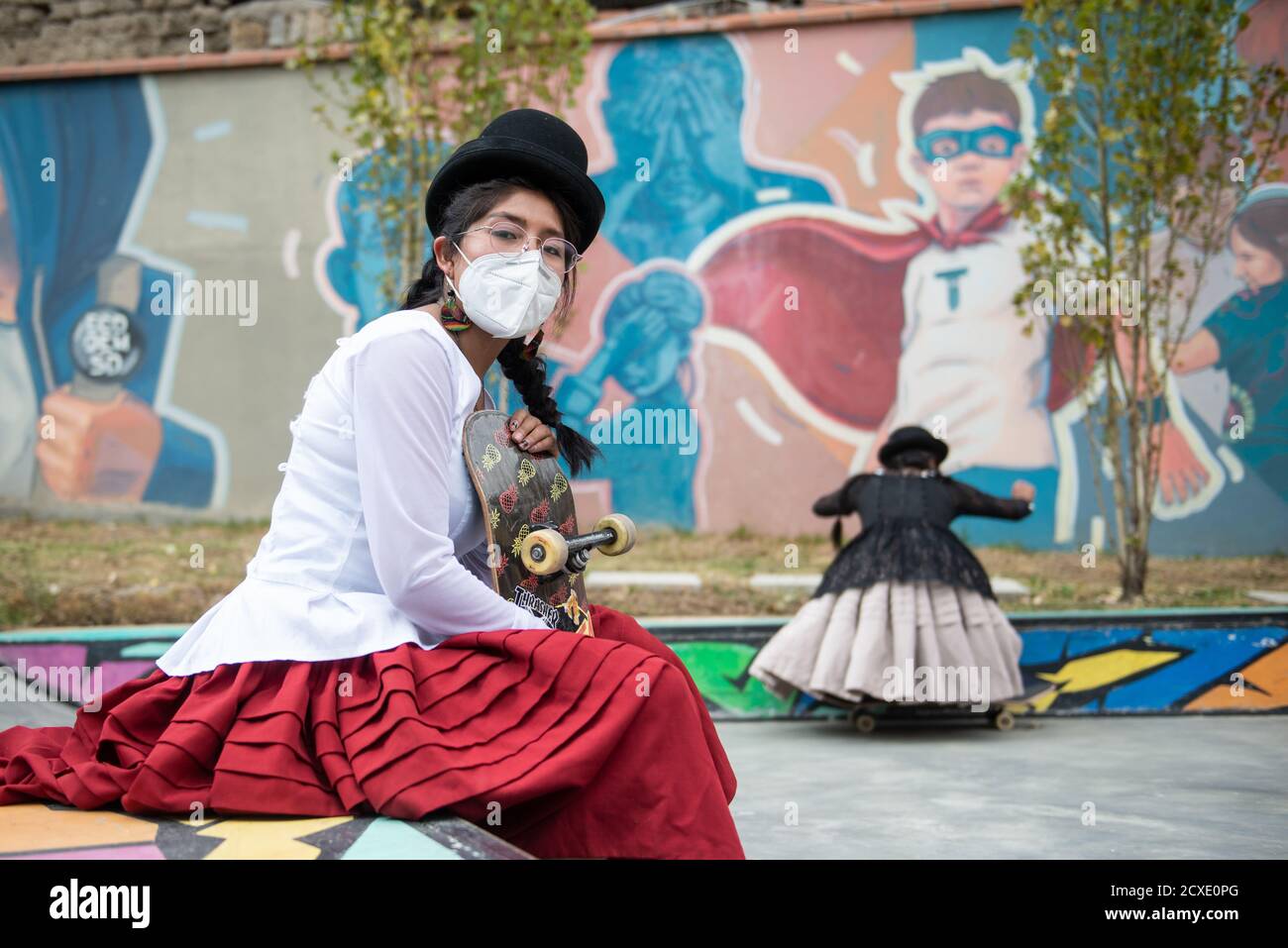 La Paz, Bolivia. 30th Sep 2020. Female skaters dressed in traditional ...