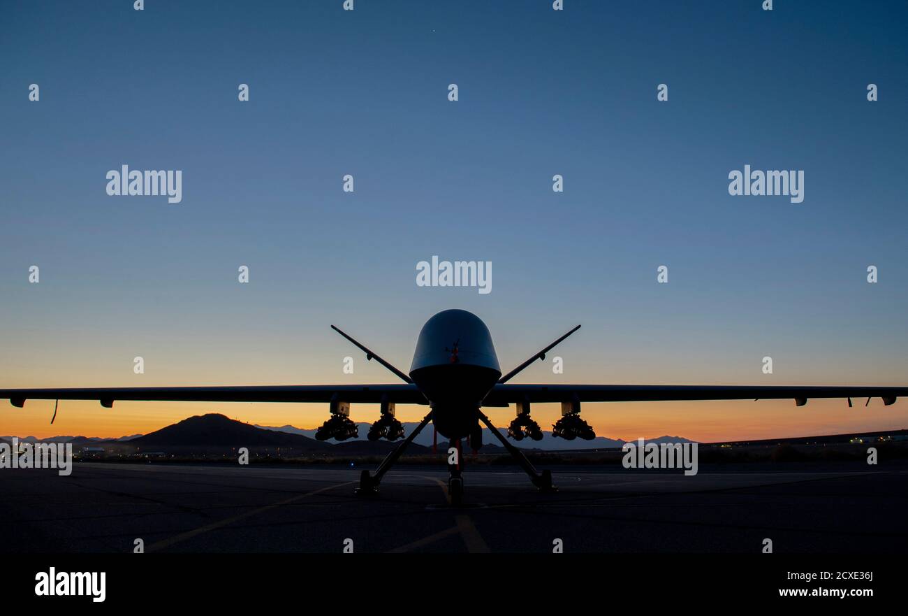 An MQ-9A Reaper assigned to the 556th Test and Evaluation Squadron sits ...