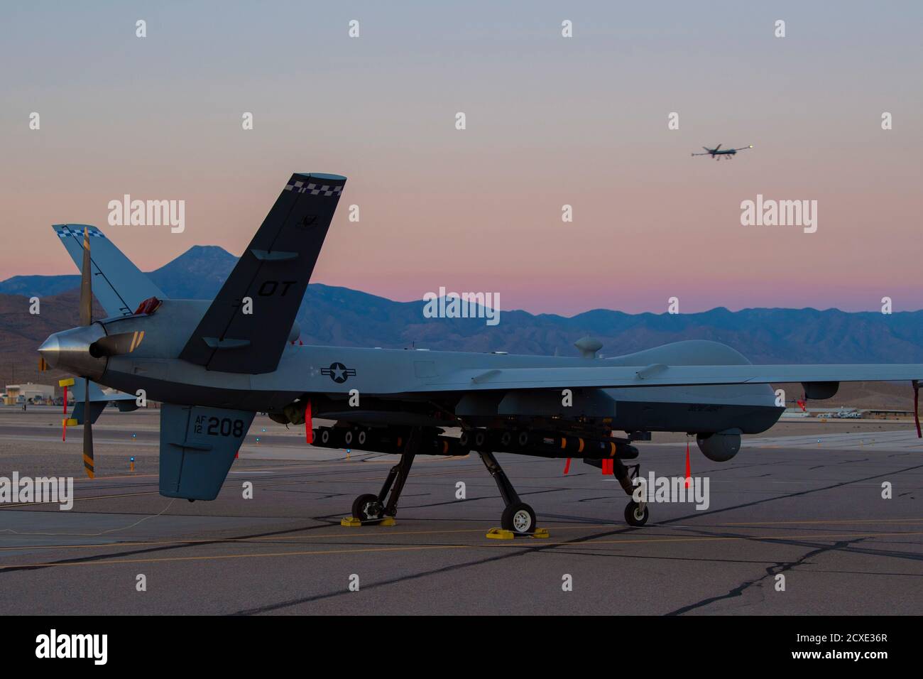 An MQ-9A Reaper assigned to the 556th Test and Evaluation Squadron sits ...