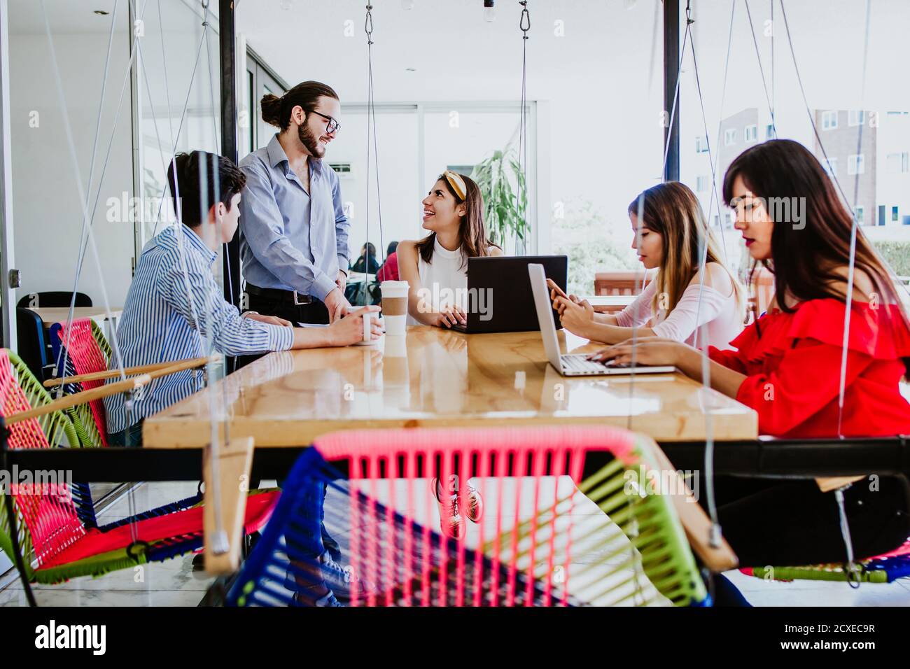 hispanic University students together with computer or laptop in Mexico ...