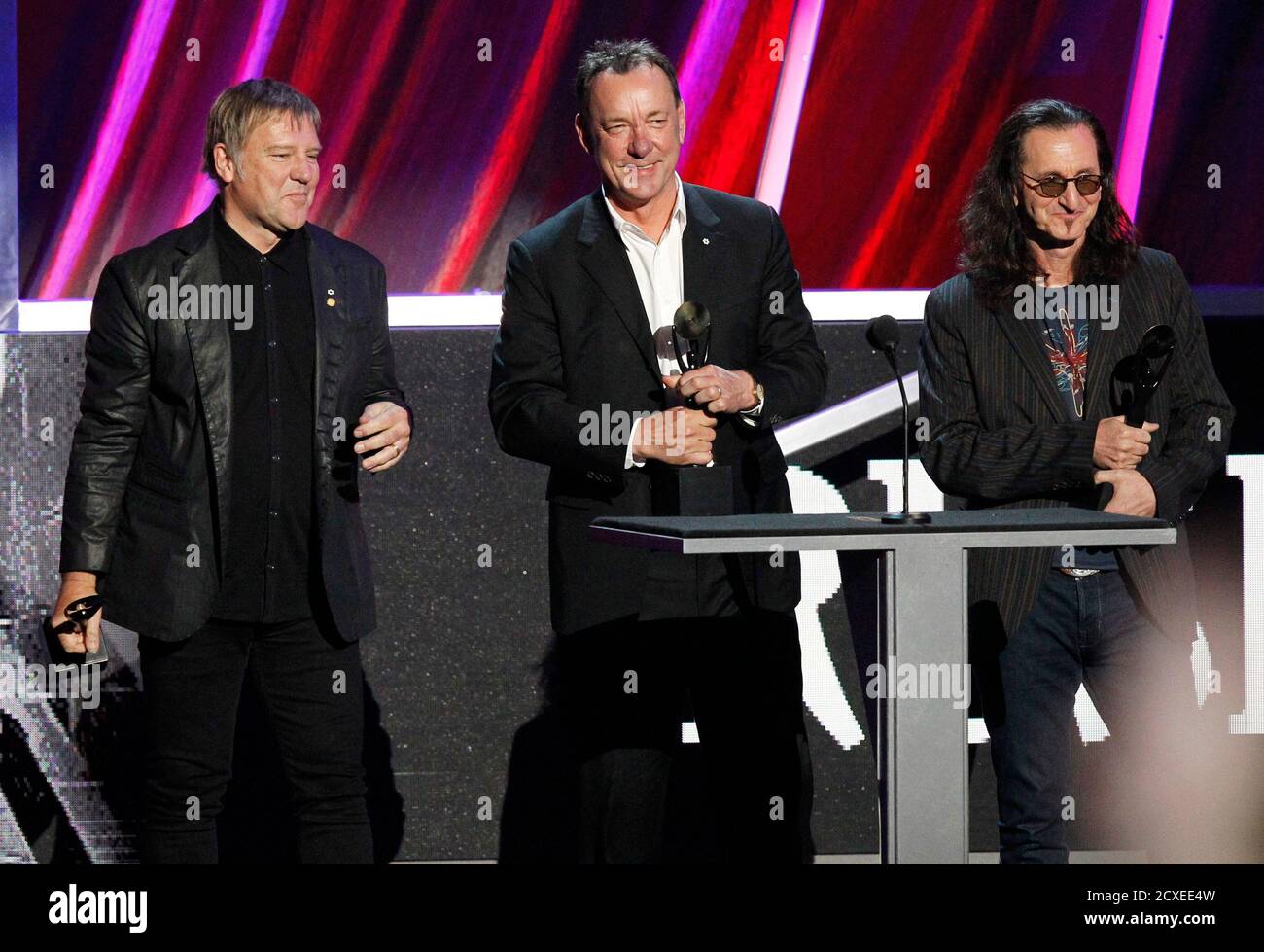 Geddy lee alex lifeson neil peart hi-res stock photography and images ...